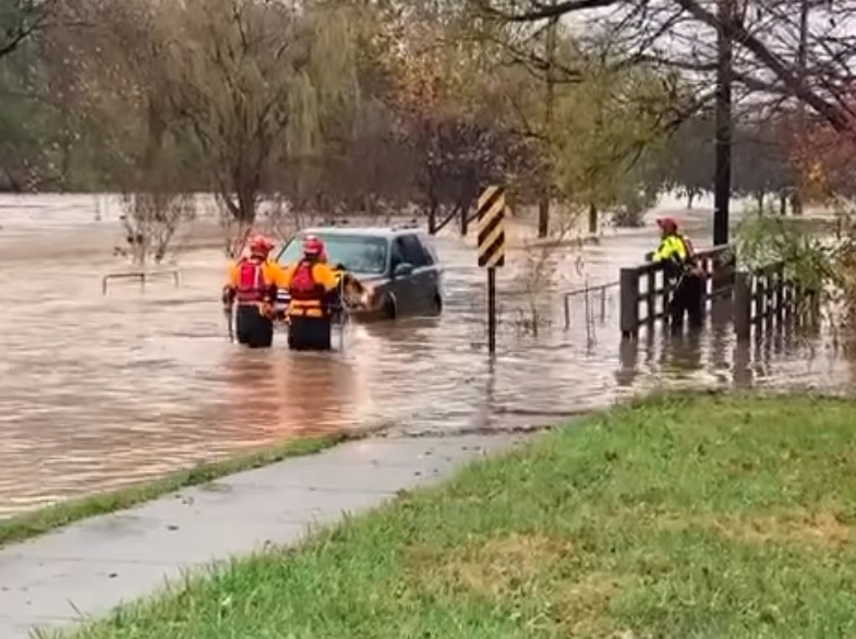 High water closes streets; crews rescue driver from stranded SUV | News ...
